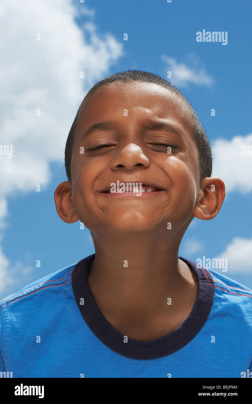 Portrait of a boy making a face Stock Photo - Alamy