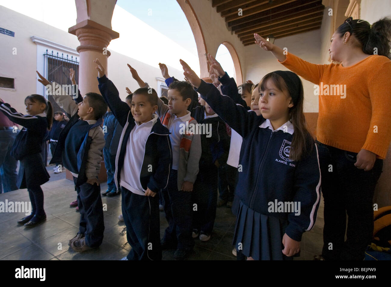 Flag raising children hi-res stock photography and images - Alamy