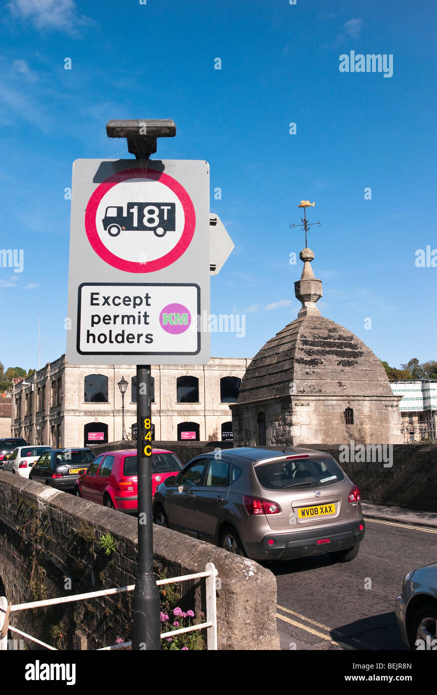 Sign indicating vehicle weight restriction across bridge and through ...