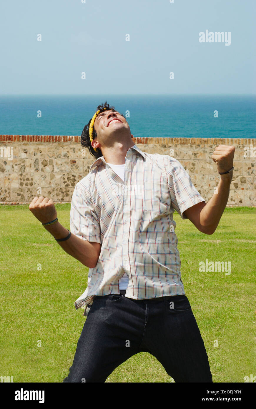 Young man looking excited Stock Photo - Alamy