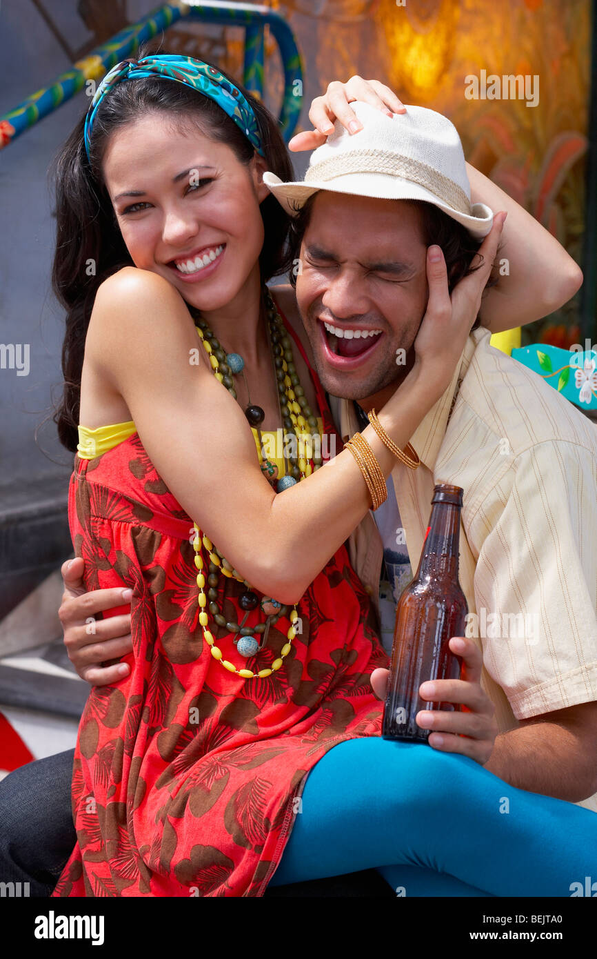 Man holding girlfriend on lap hi-res stock photography and images - Alamy