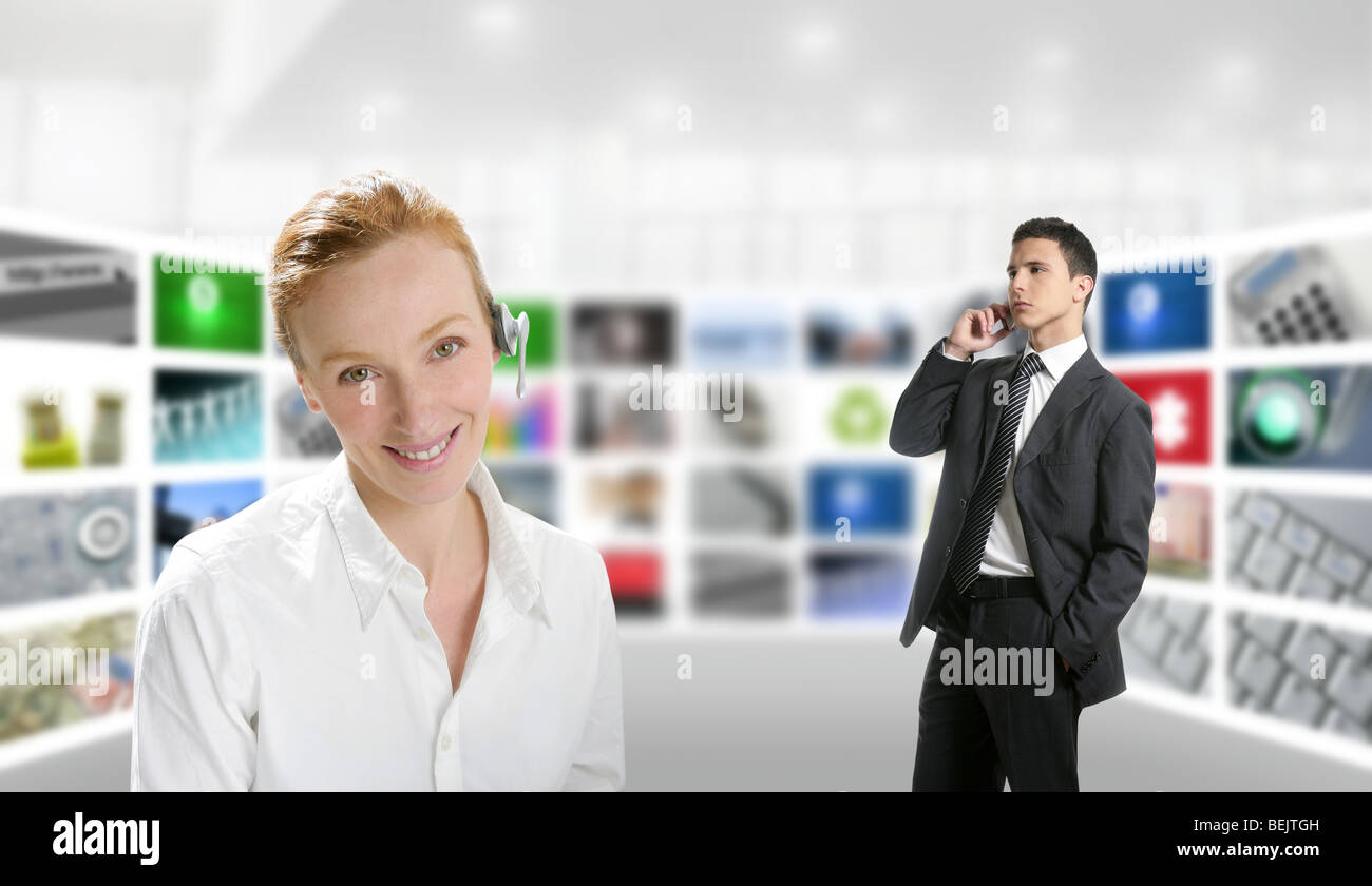 Modern office with woman and businessman over tv screen wall Stock ...