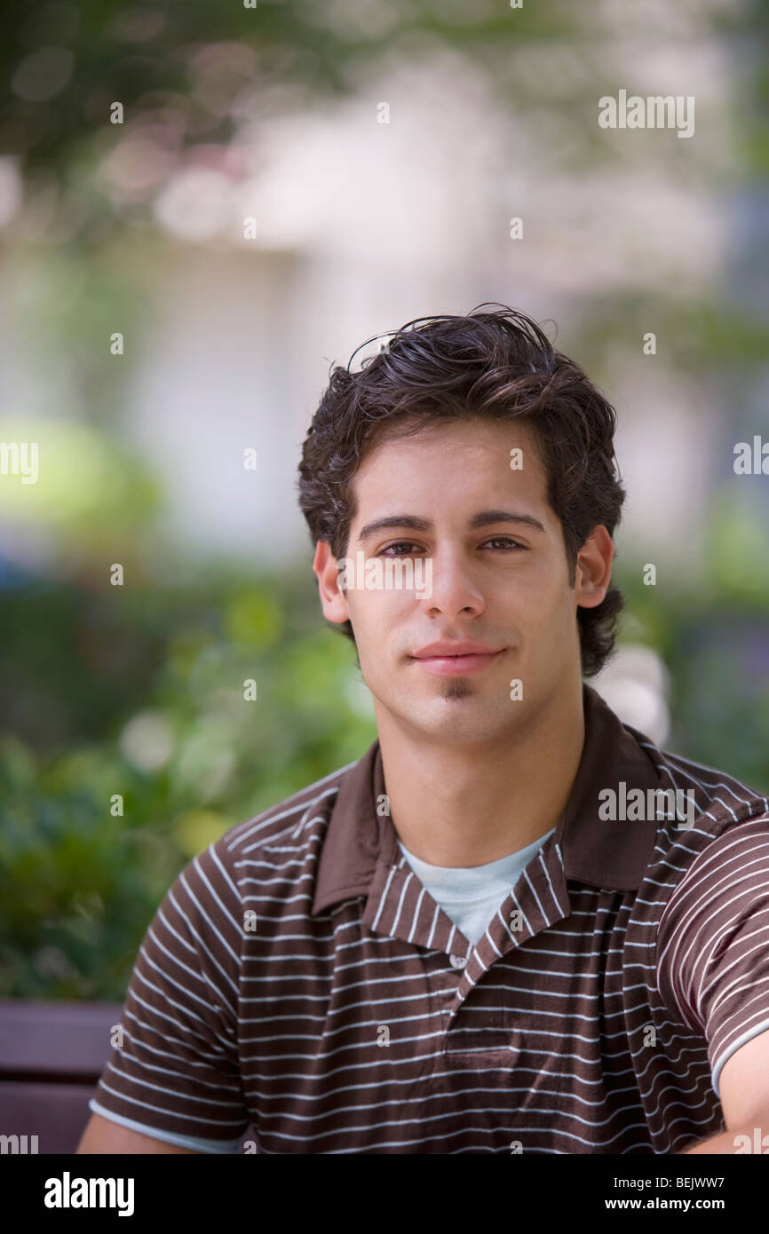 Portrait of a young man smiling Stock Photo - Alamy