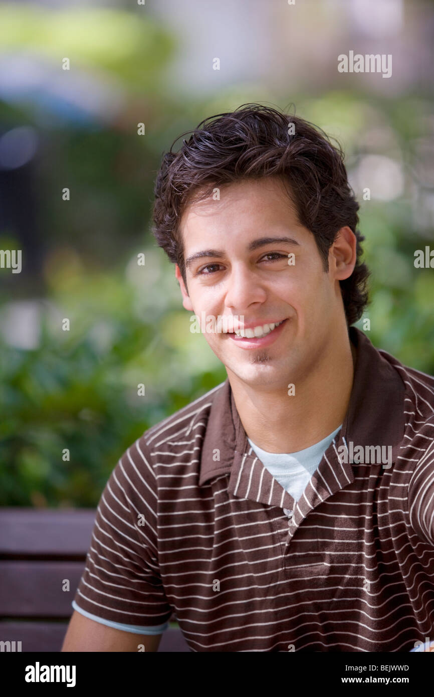 Portrait of a young man smiling Stock Photo - Alamy