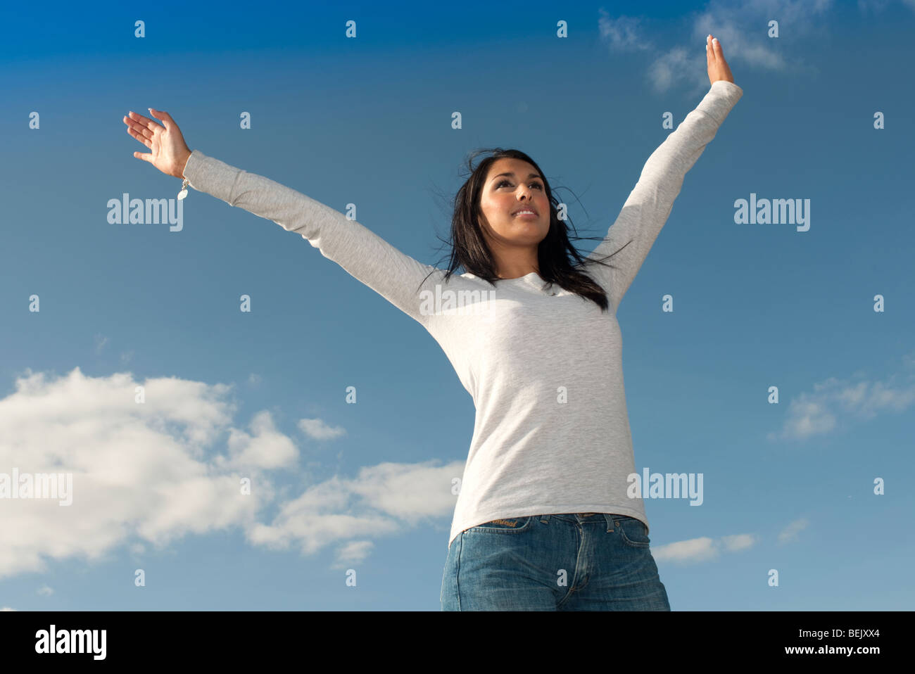 woman stretching arms out Stock Photo - Alamy