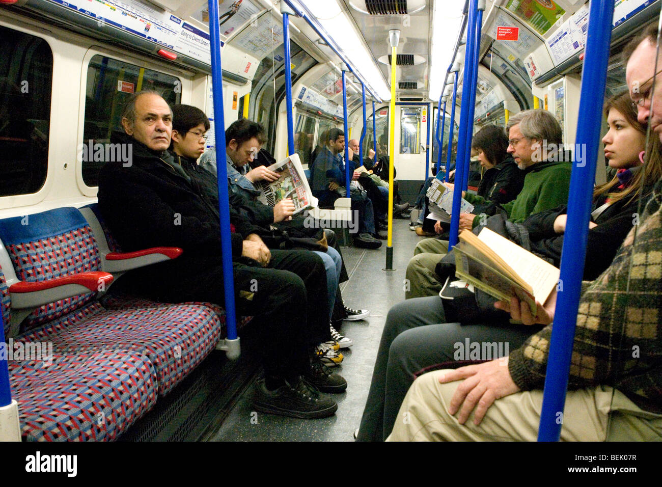 Commuters on a Tube train, London, England Stock Photo - Alamy