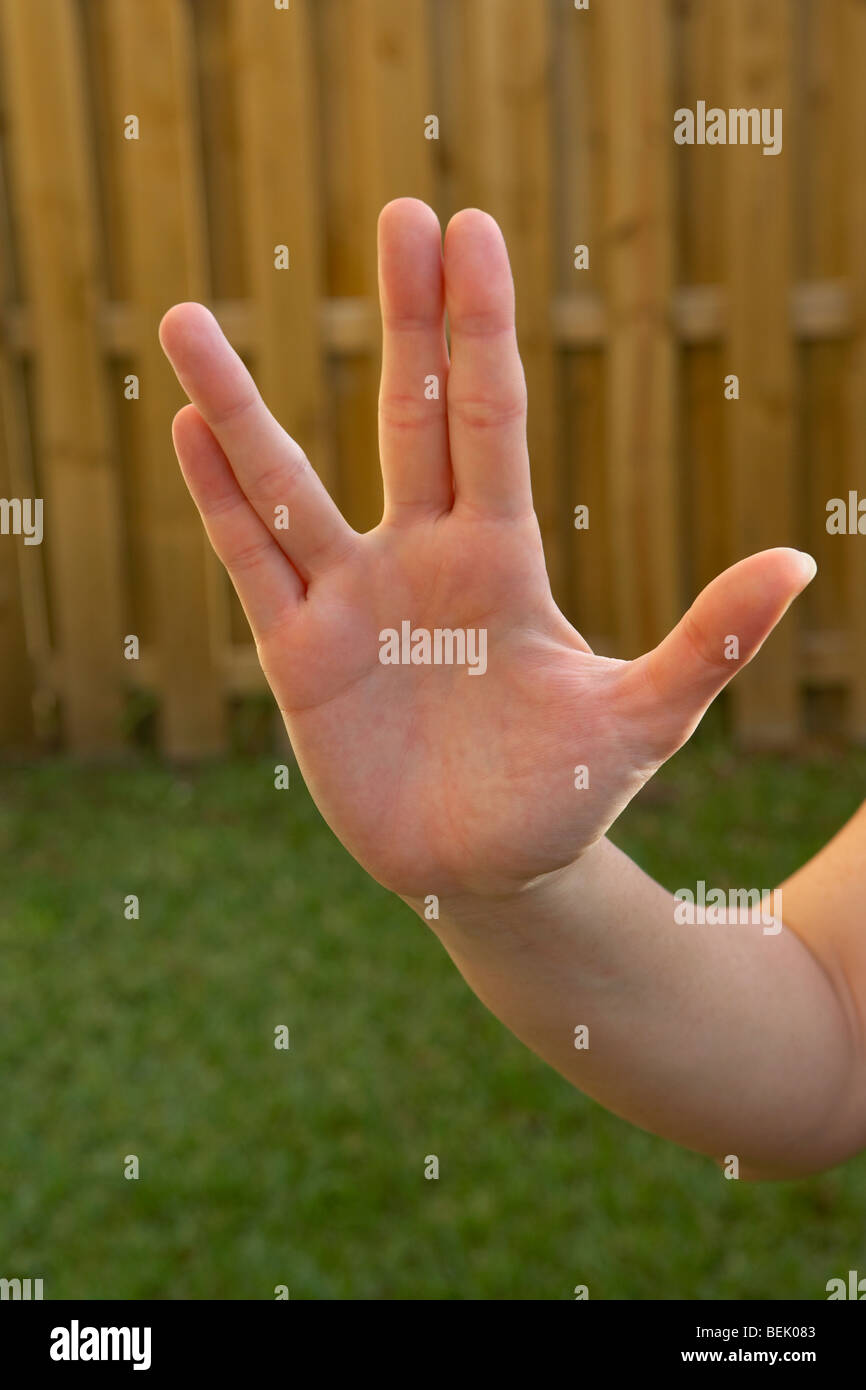 Close-up of a woman's hand making a hand sign Stock Photo - Alamy