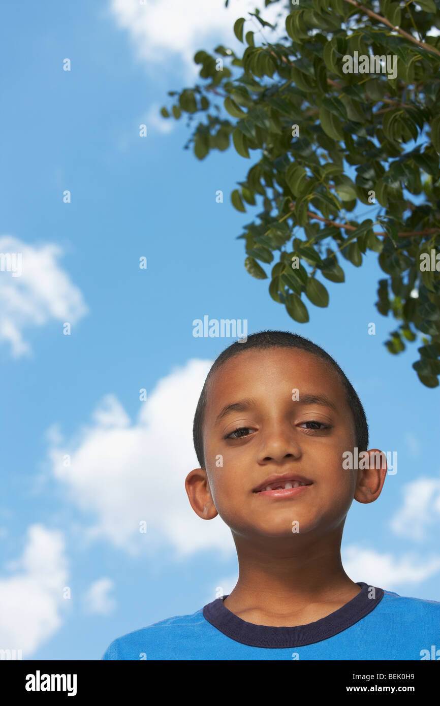 Portrait of a boy making a face Stock Photo - Alamy