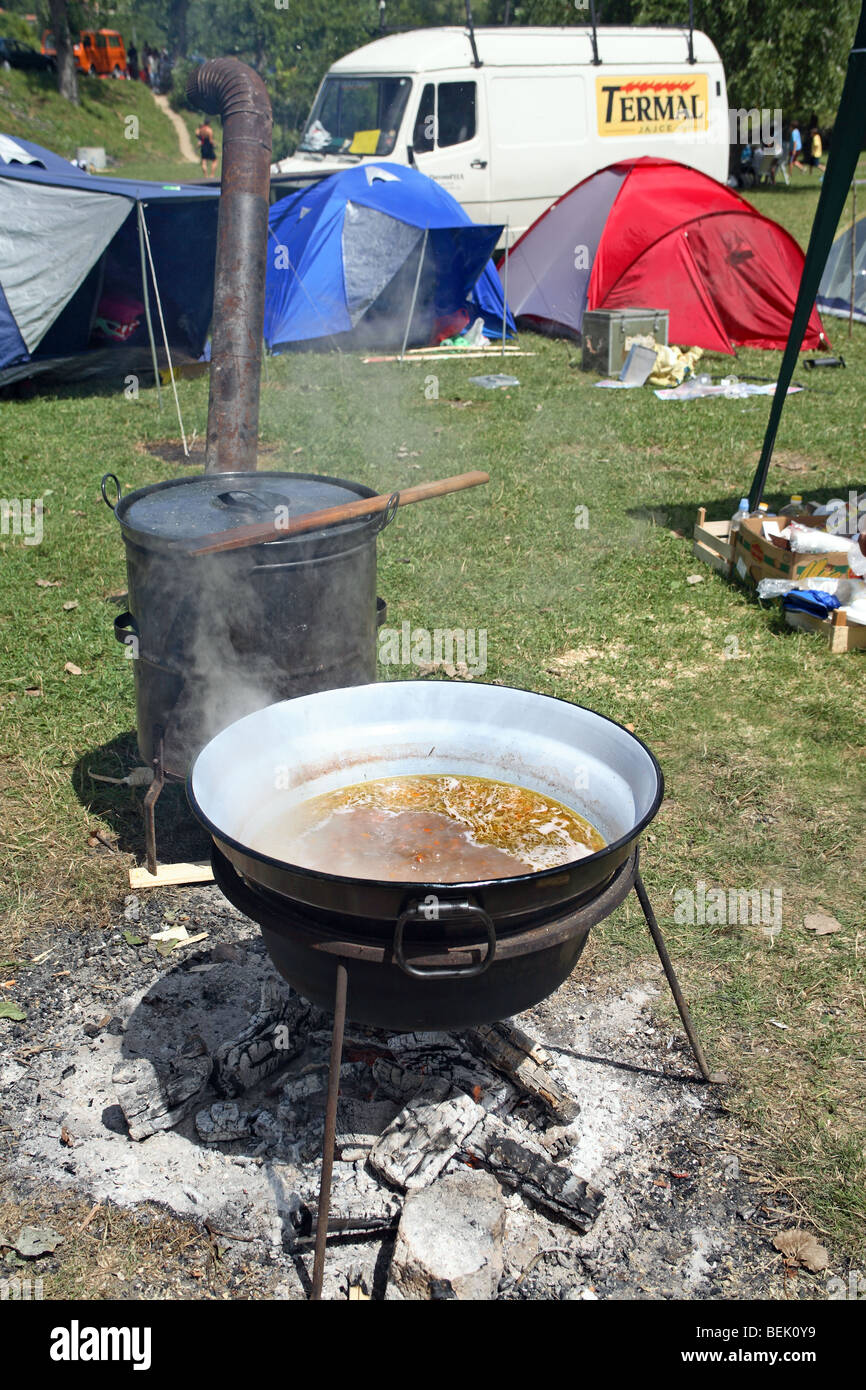 Outdoor kitchen food preparing on open fire Stock Photo - Alamy