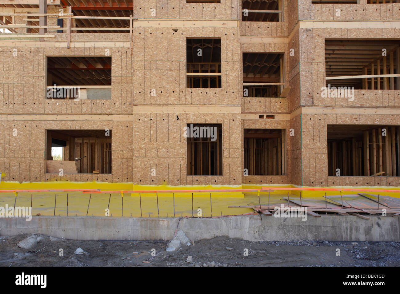 Apartment building construction framing Stock Photo - Alamy