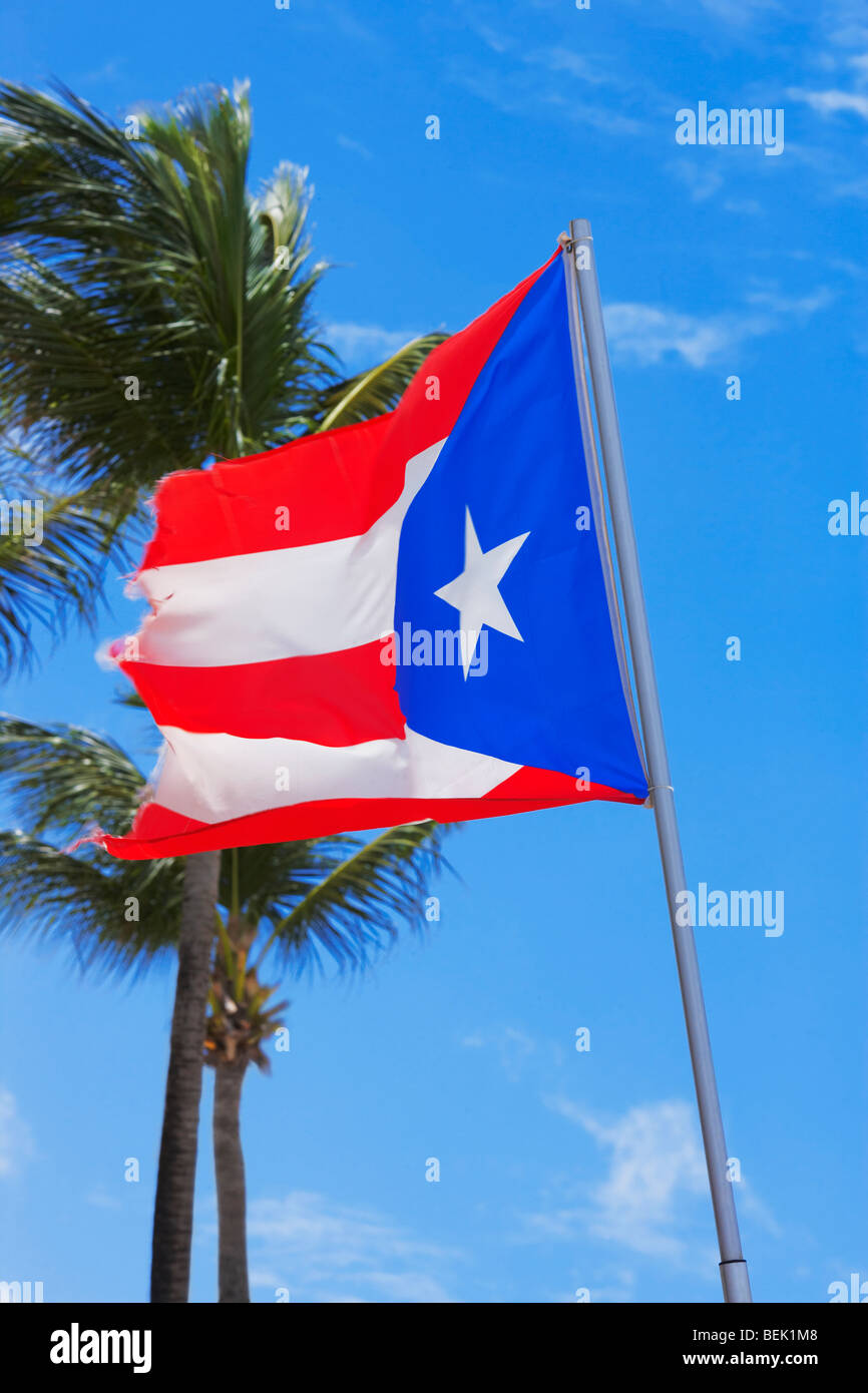 Low angle view of a Puerto Rican flag fluttering, Luquillo Beach ...