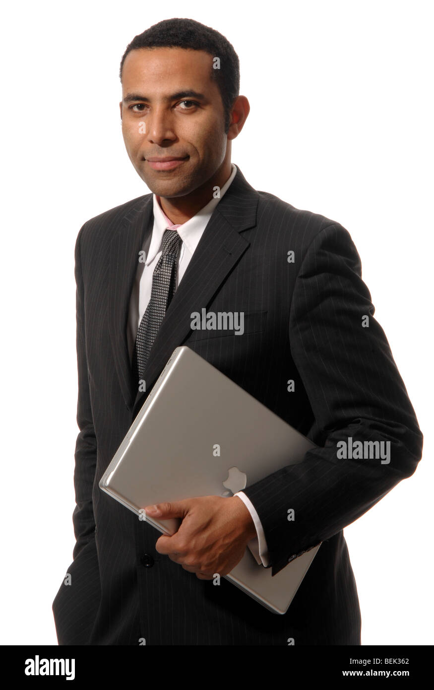 Confident mixed race businessman with laptop Stock Photo - Alamy