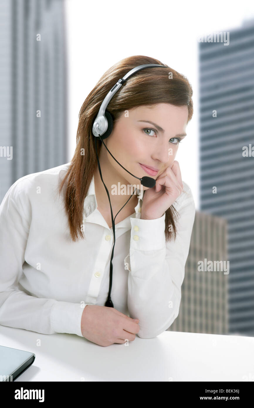 Business helpdesk with beautiful woman and headphones micro Stock Photo ...