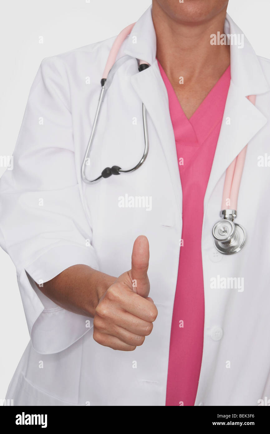 Close-up of a female doctor showing a thumbs up sign Stock Photo - Alamy