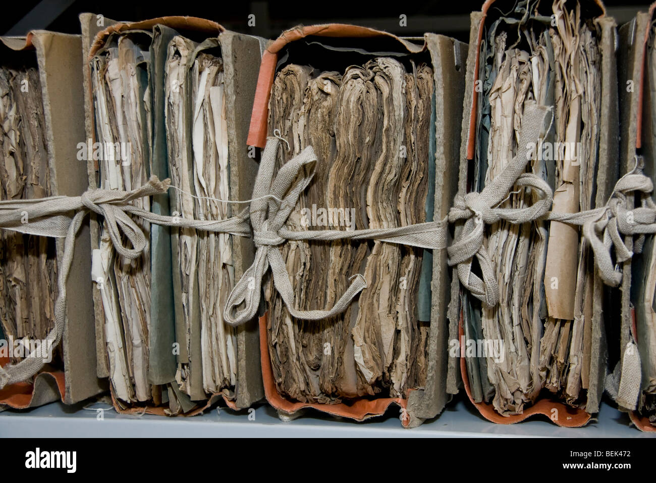 Collection of very old papers stored in folders, bound together Stock ...