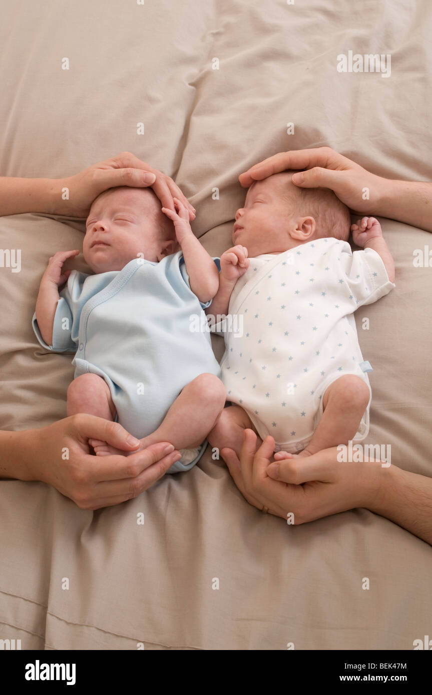 Parents demonstrating containment holding for premature babies Stock ...