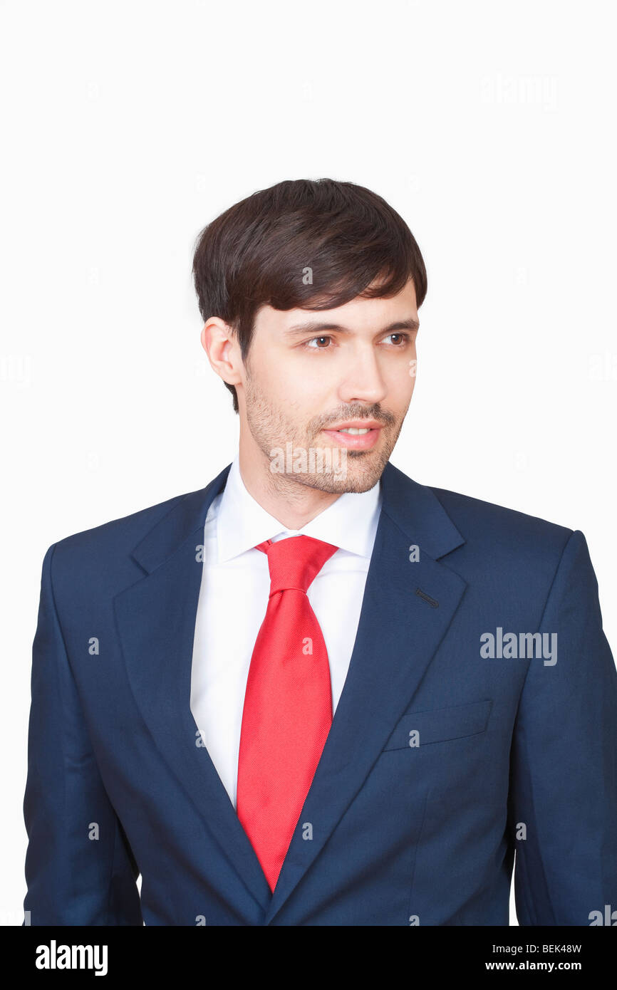 portrait handsome business executive in suit isolated on white ...