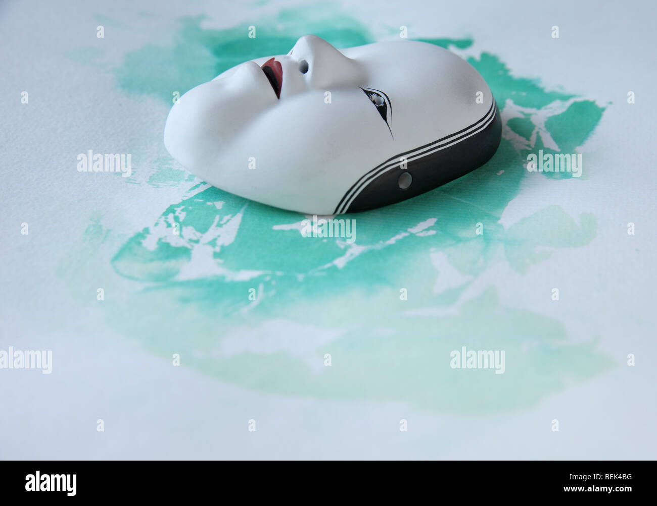 female noh mask on a green watercolor background Stock Photo - Alamy