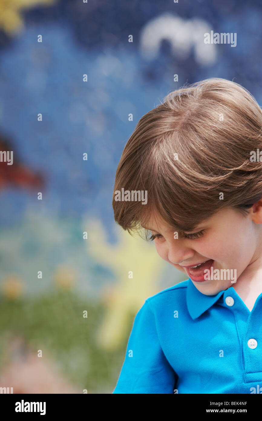 Close-up of a boy looking down Stock Photo - Alamy
