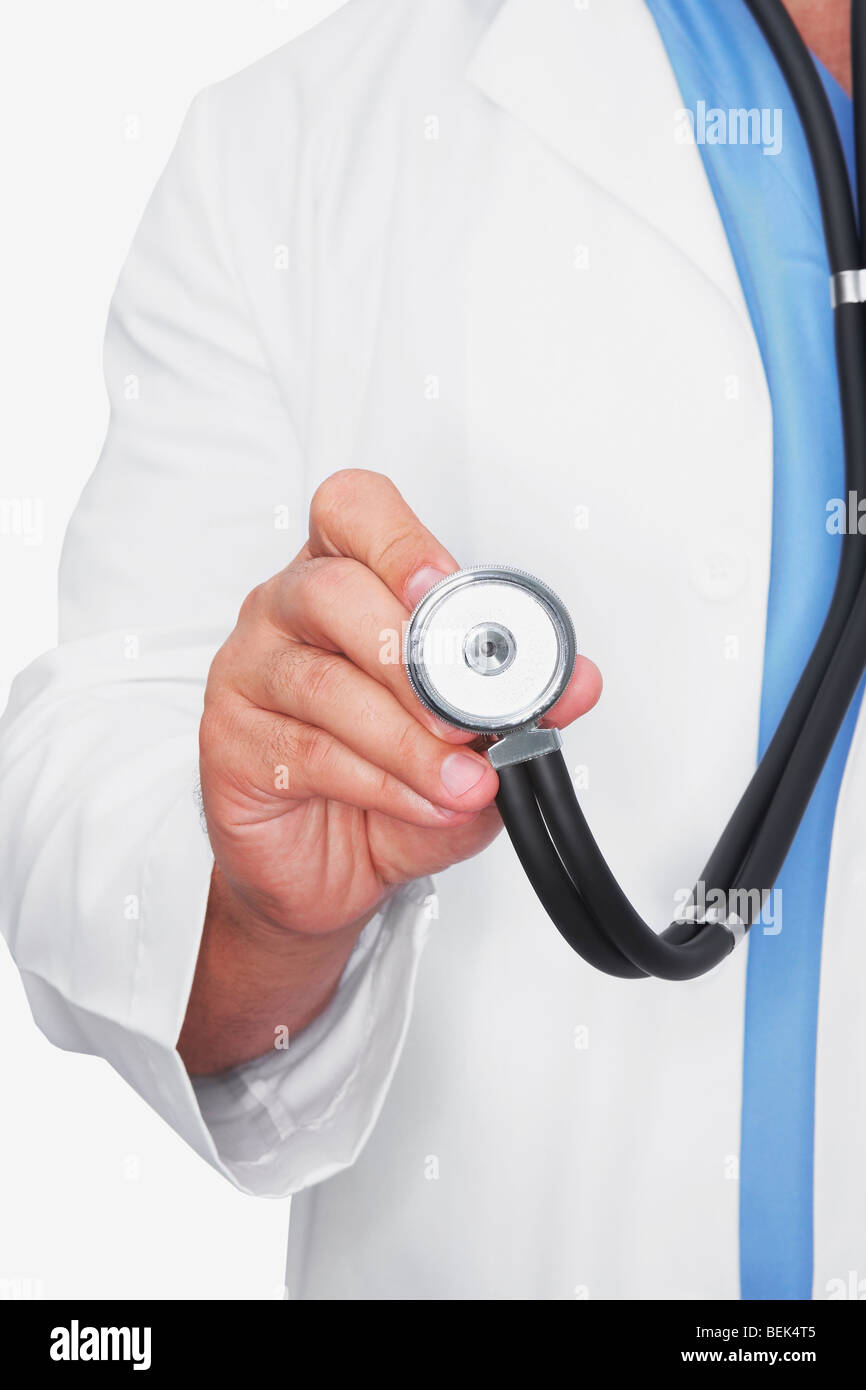 Mid section view of a male doctor holding a stethoscope Stock Photo - Alamy