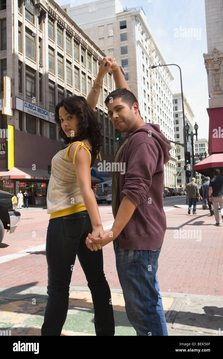 Side profile of a young couple salsa dancing on the road Stock Photo ...