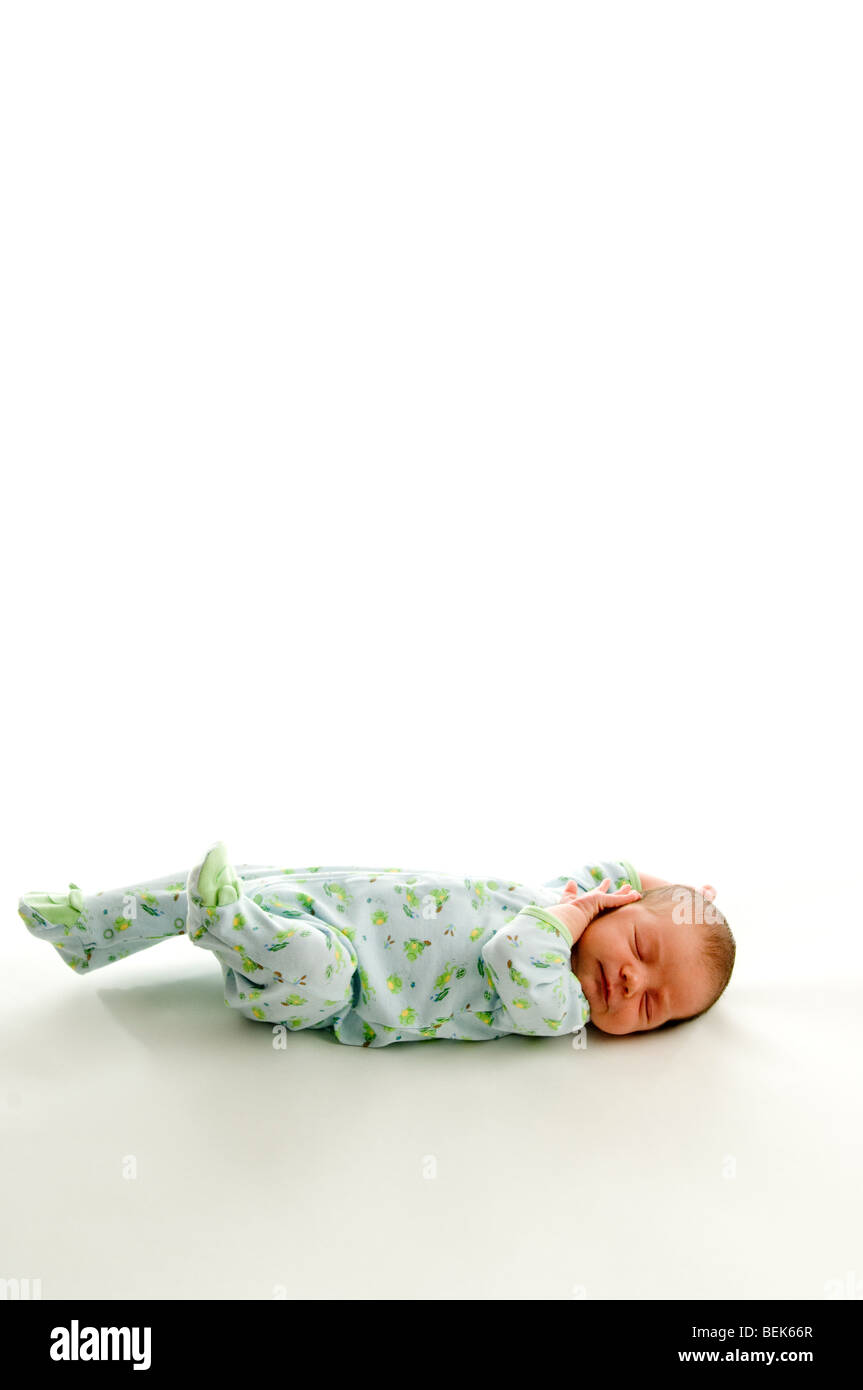 Young baby boy / infant on a white background Stock Photo - Alamy