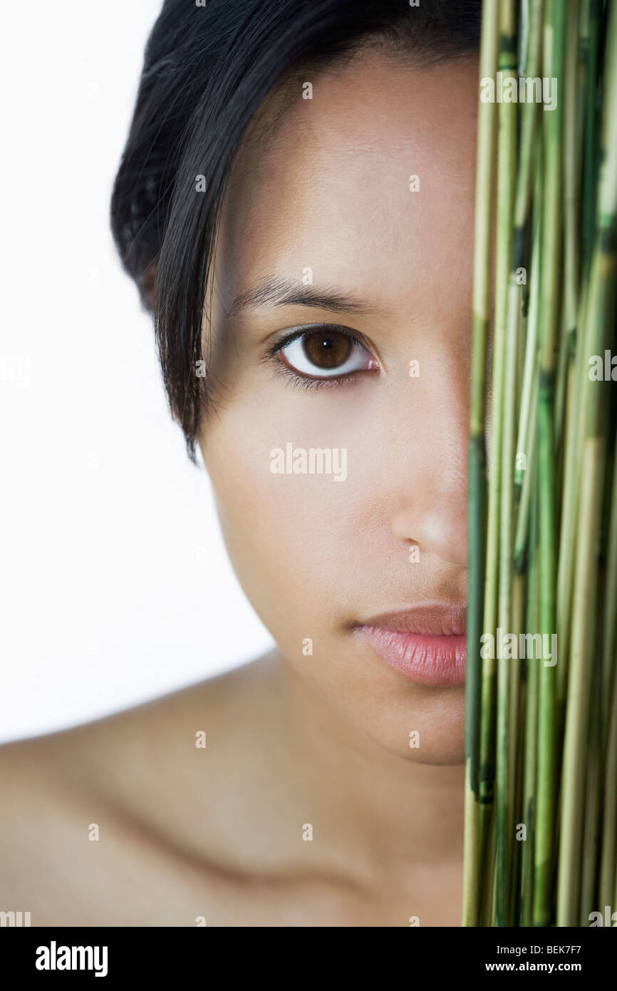 Close-up of a woman's face with plants Stock Photo - Alamy