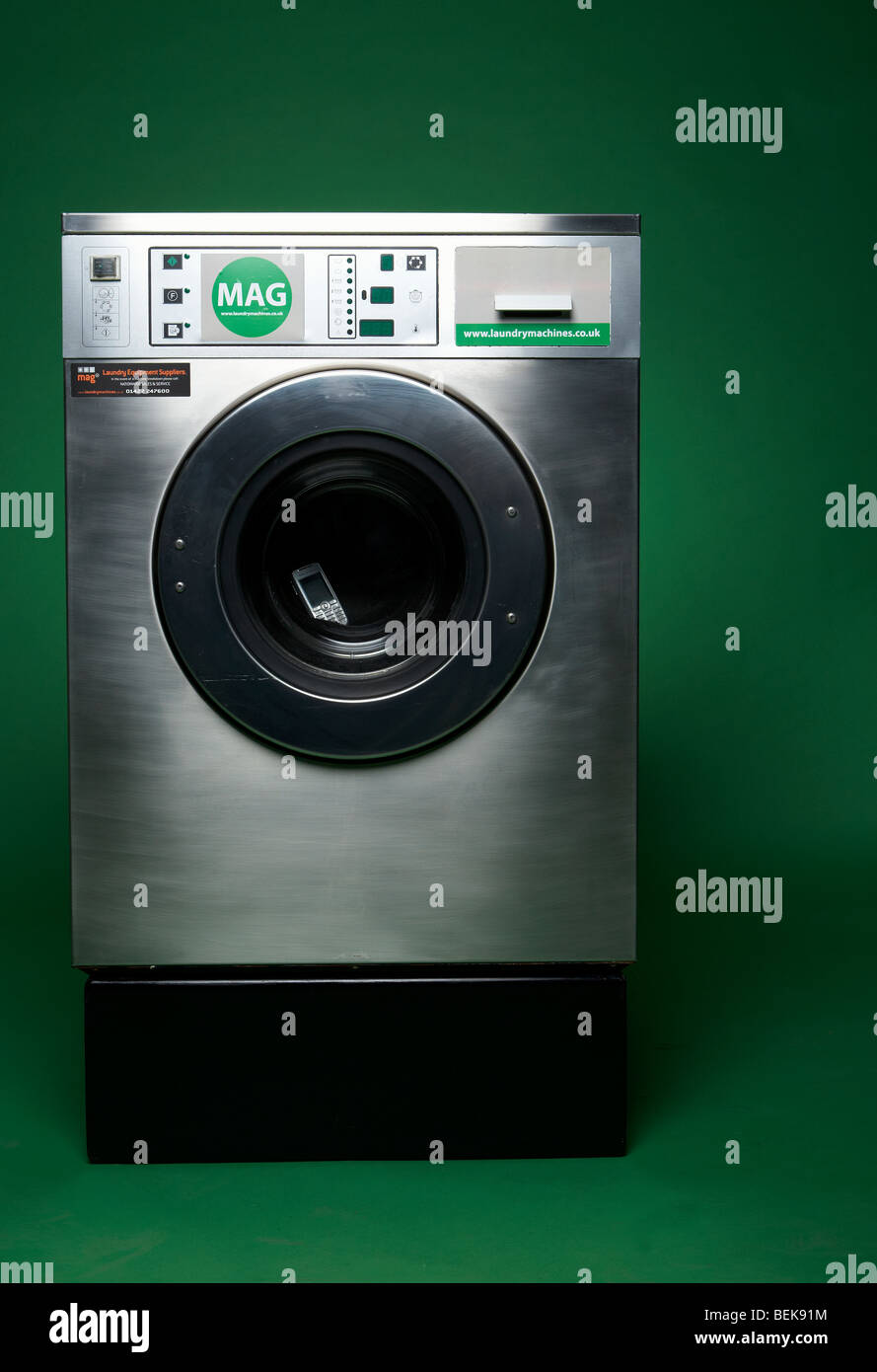 Mobile phone sits in washing hi-res stock photography and images - Alamy