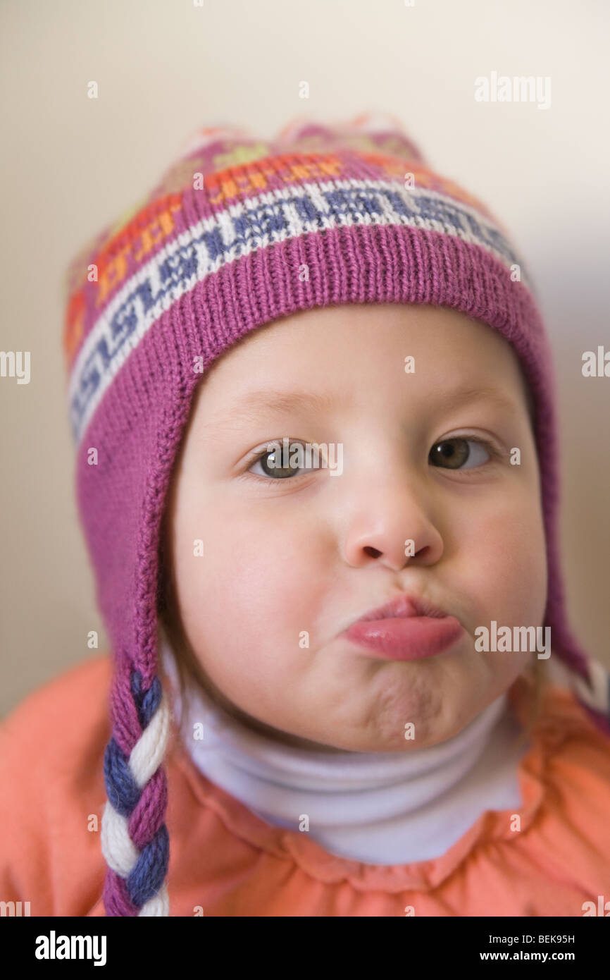 Portrait of a girl making a funny face Stock Photo - Alamy