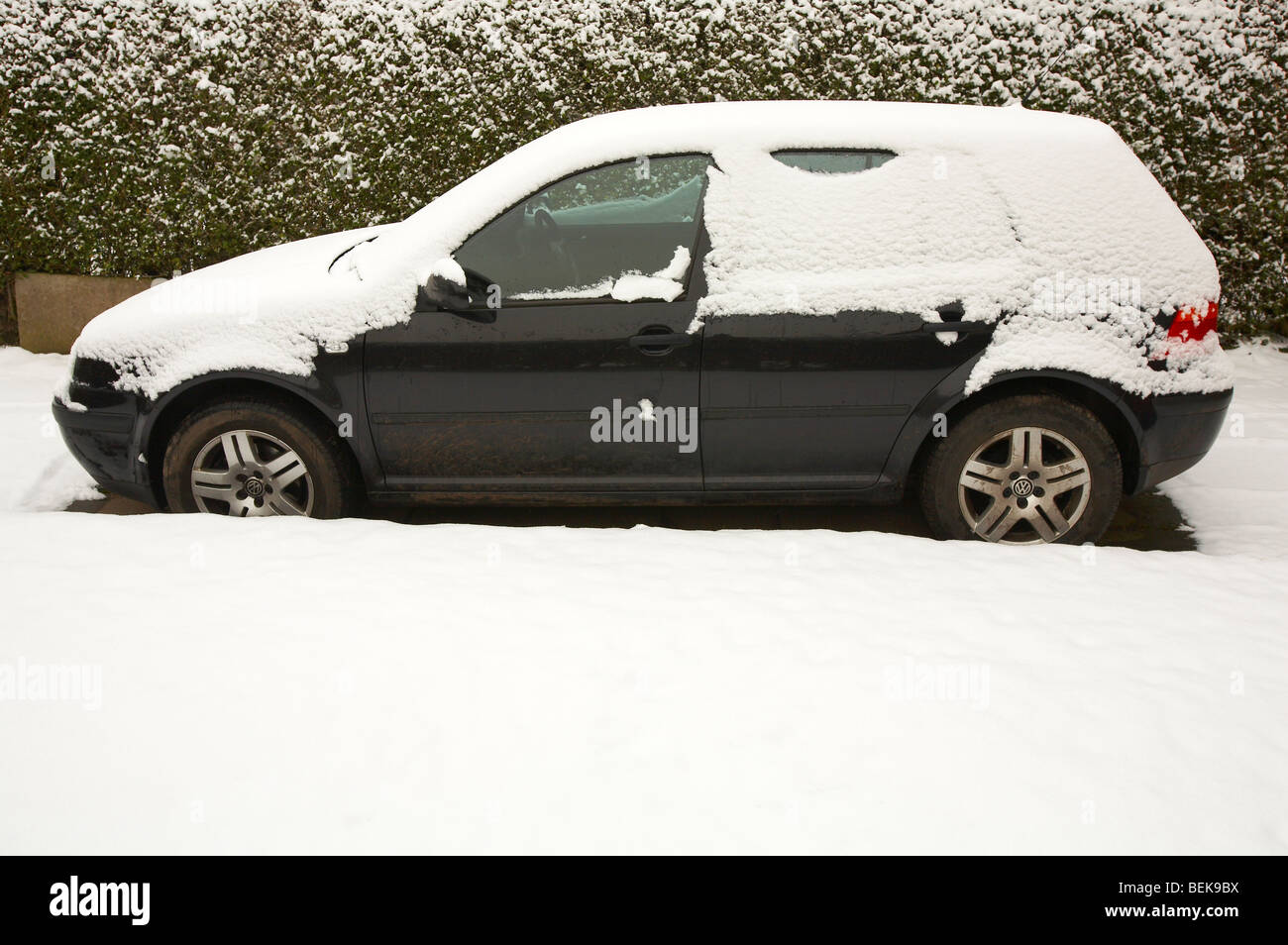 Black Volkswagen Golf TDI covered in snow Stock Photo - Alamy