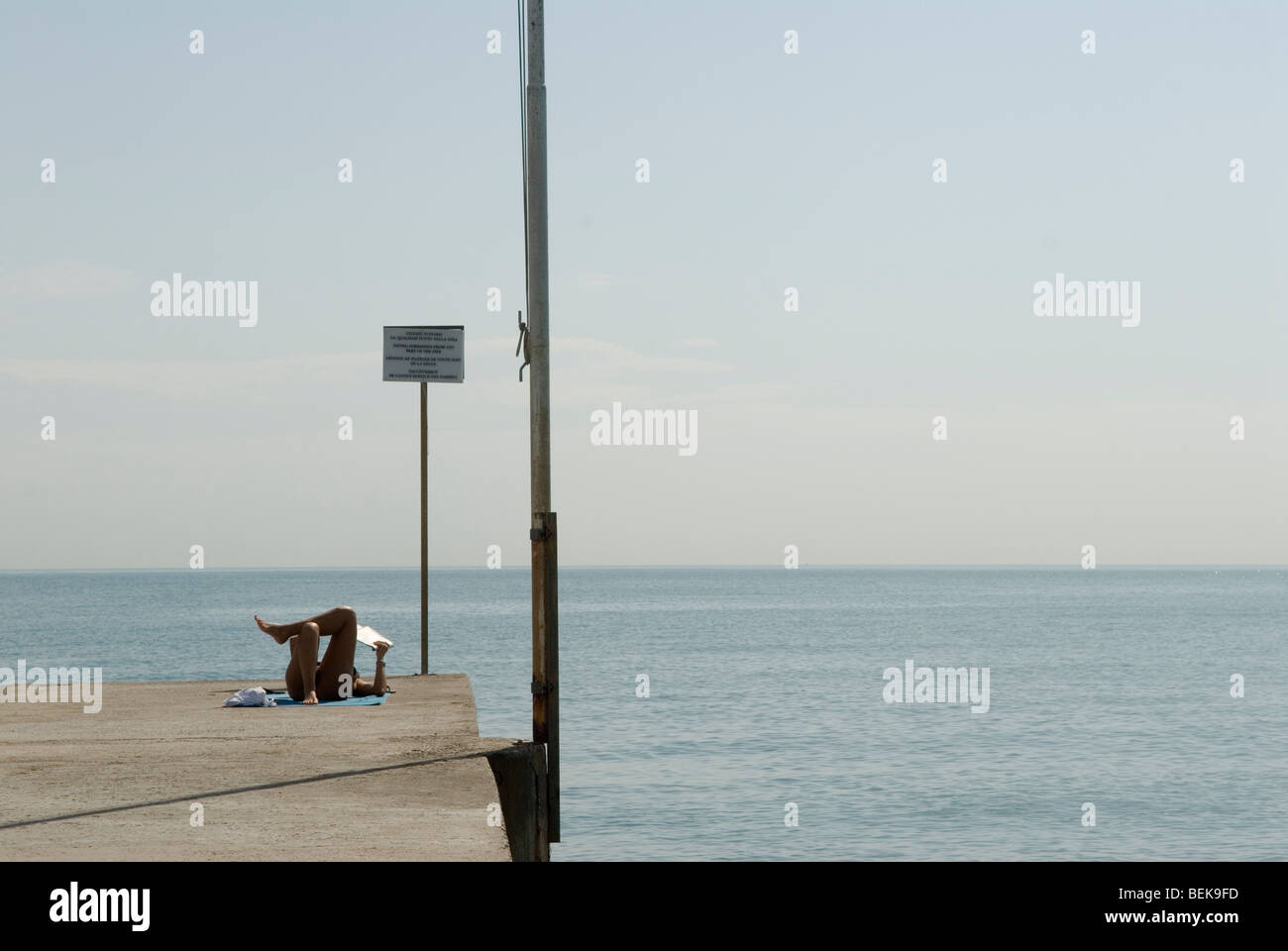 Italian woman sunbathing on beach hi-res stock photography and images ...