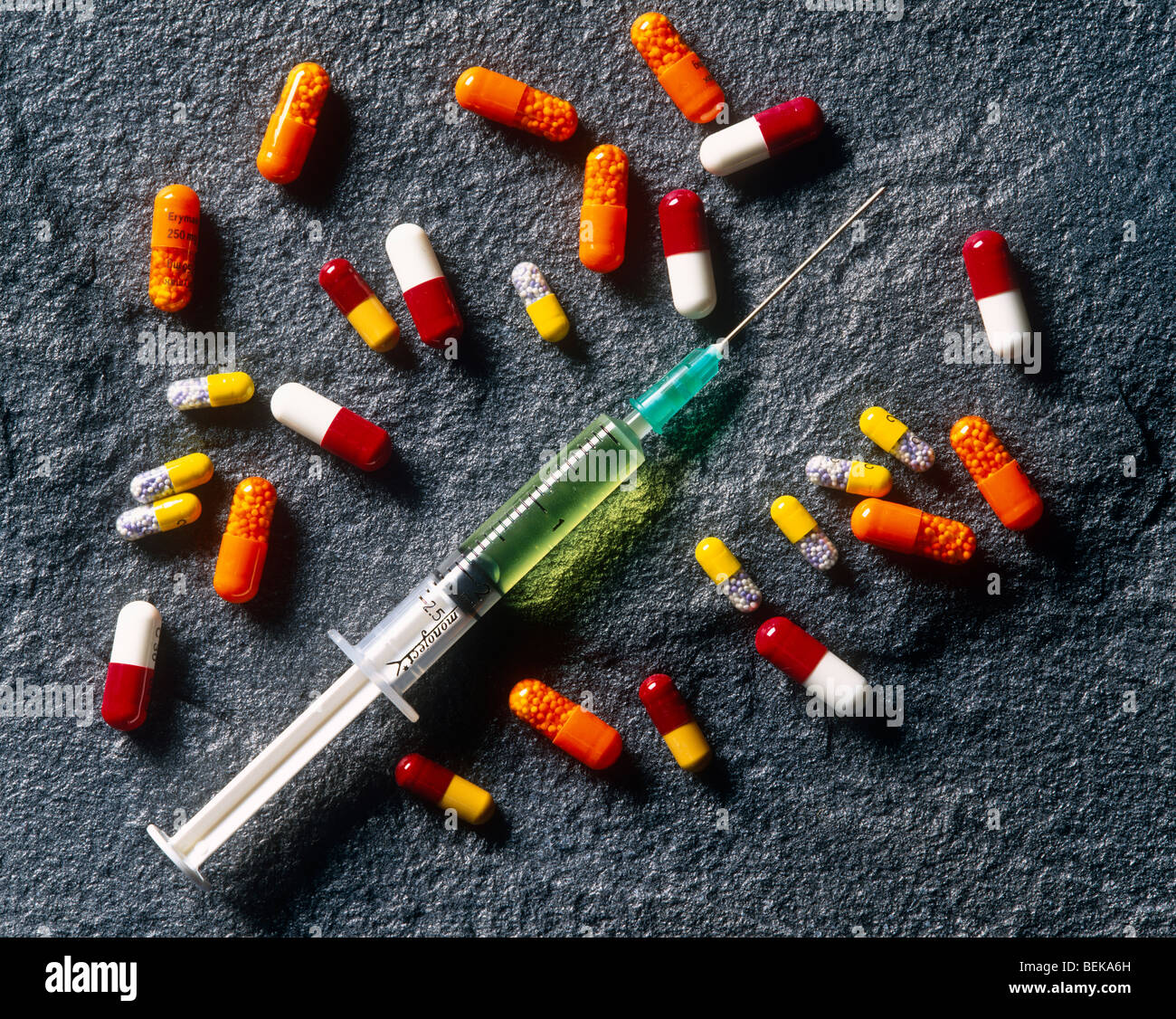 Close shot with syringe and capsules Stock Photo - Alamy