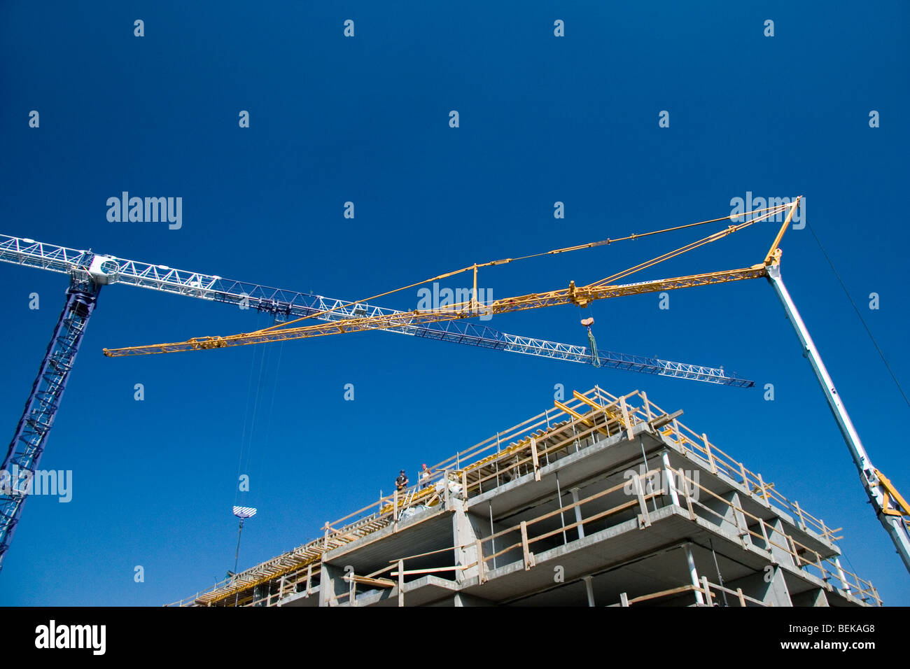 Cranes at construction site hi-res stock photography and images - Alamy