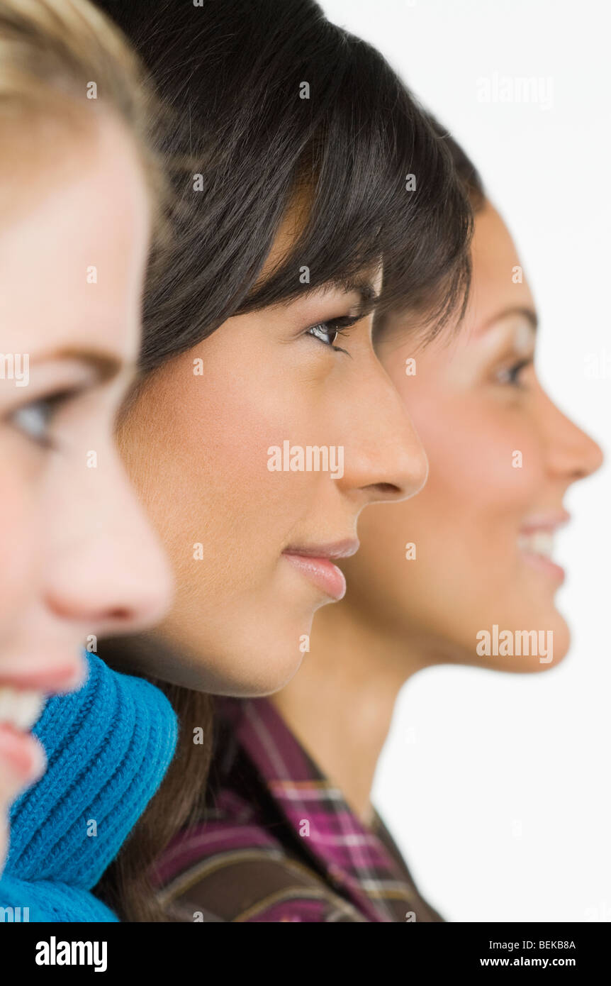Three women in a row Stock Photo - Alamy