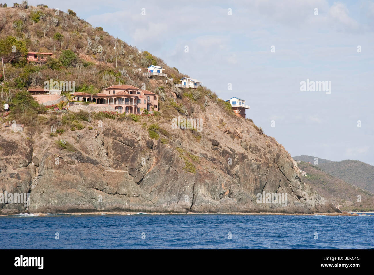 Houses on a seaside hill, SW portion St John Stock Photo - Alamy