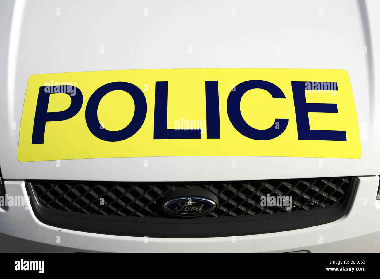 Close up of the logo on a police car saying Police Stock Photo - Alamy
