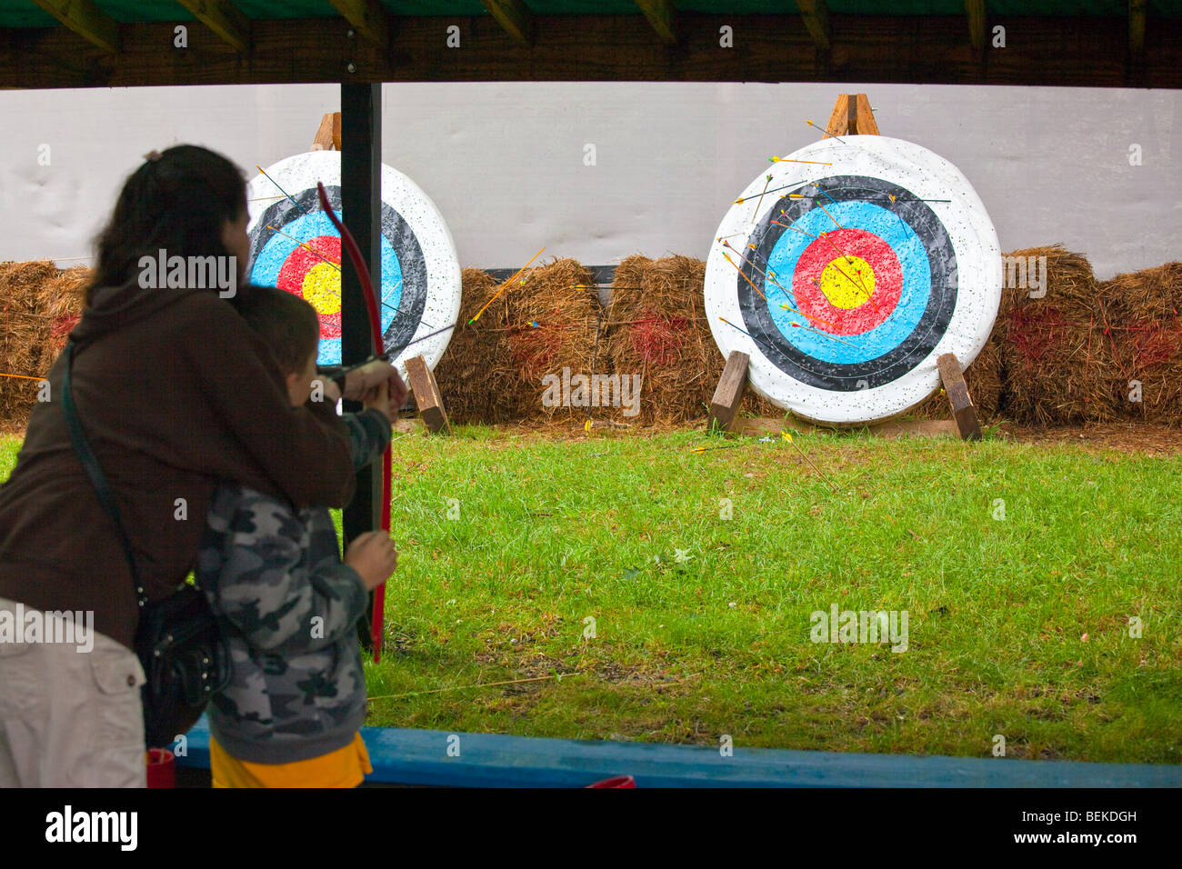 Mother Teaching Son Archery at the Renaissance Fair in Tuxedo, New York ...