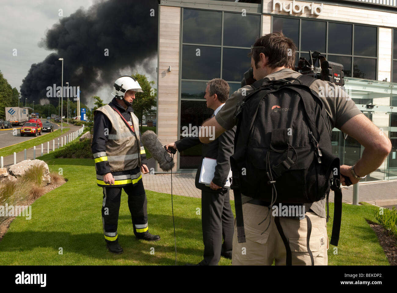Senior Fire Commander gives interview to reporters at scene of large ...