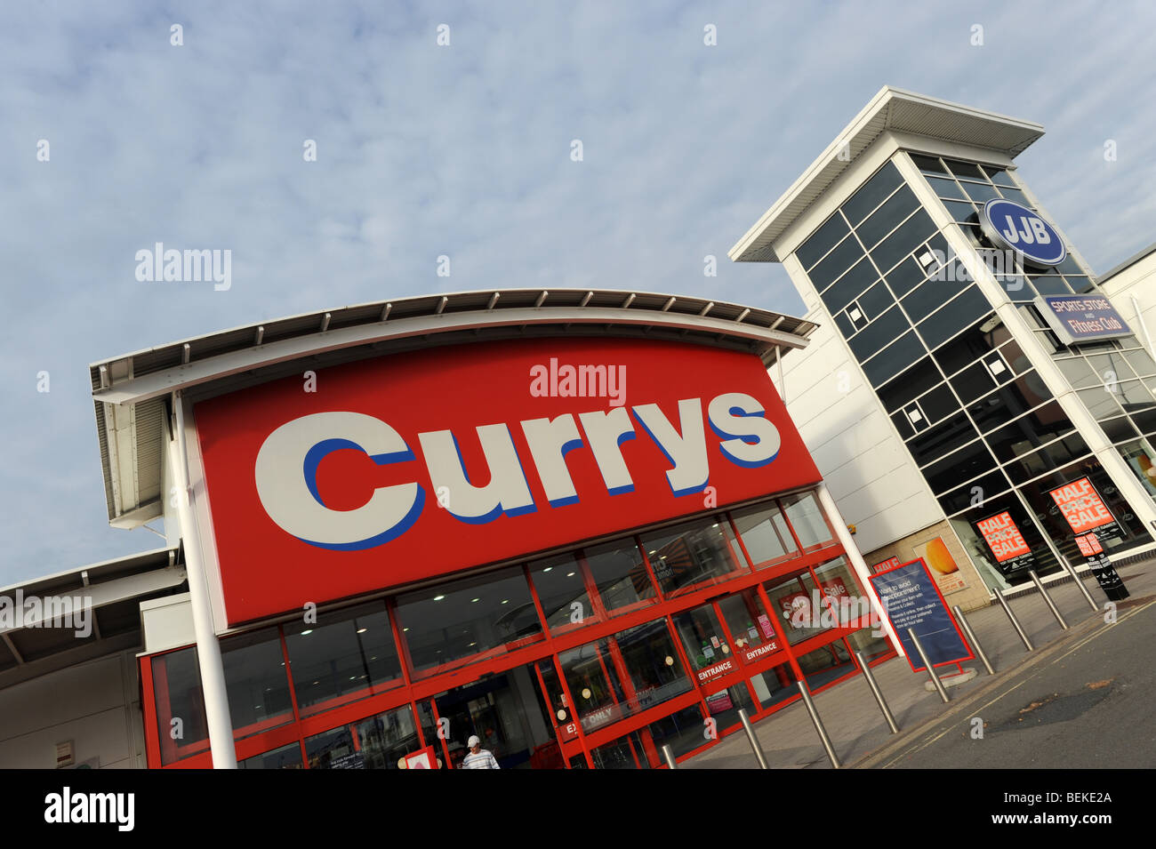 Currys store sign and logo England Uk Stock Photo - Alamy