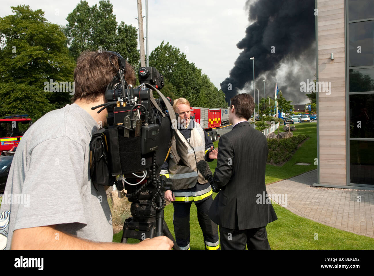 Senior Fire Commander gives interview to reporters at scene of large ...