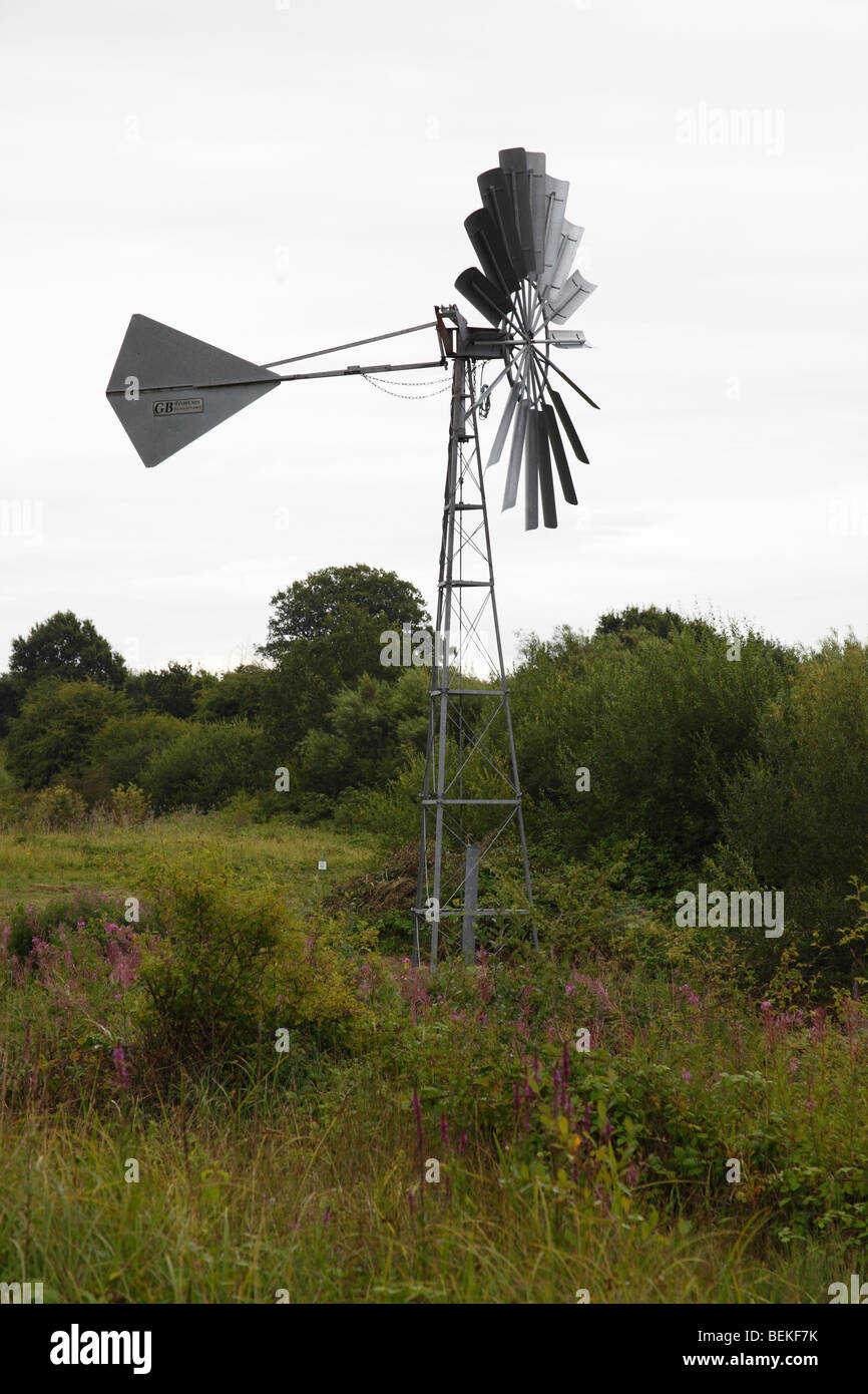 Wind operated water pump for water level control Stock Photo - Alamy
