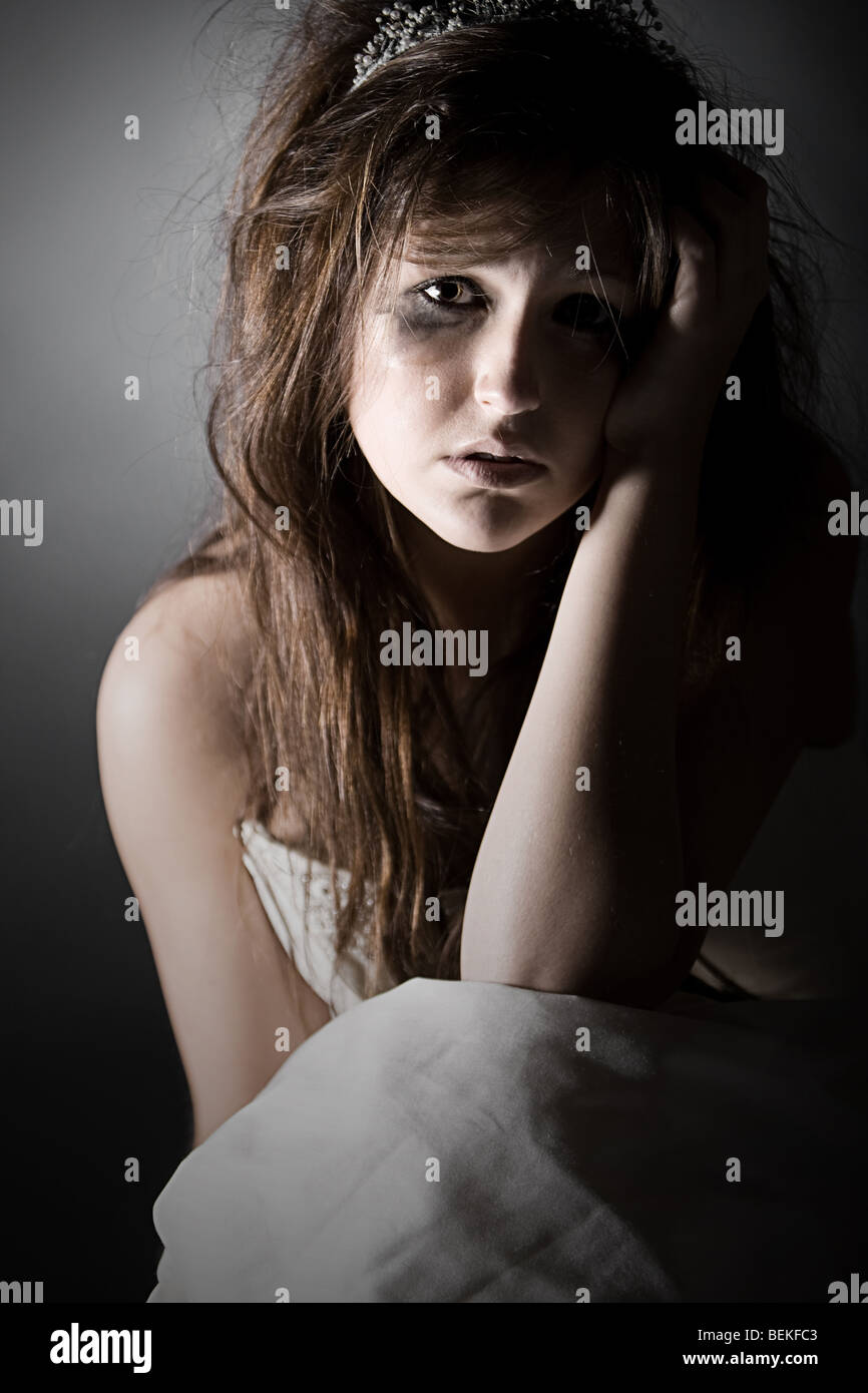 Powerful Low Key Shot of an Upset Teenage Bride Stock Photo - Alamy