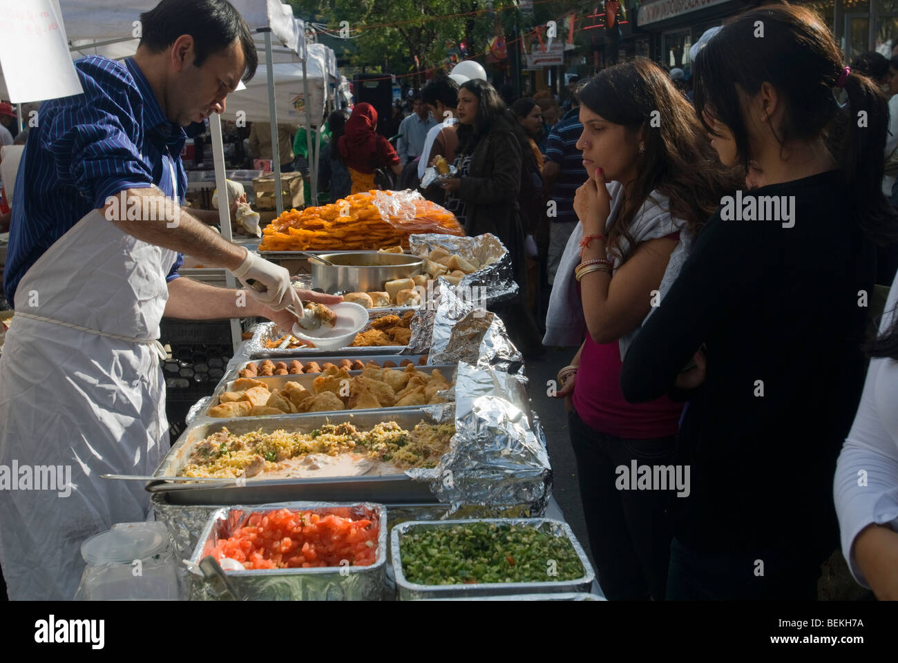 Indian-Americans and other visitors celebrate the Diwali at a street ...
