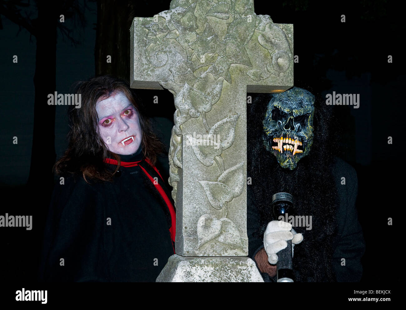 Halloween Vampire & Monster in front of cemetery gravestone Stock Photo ...