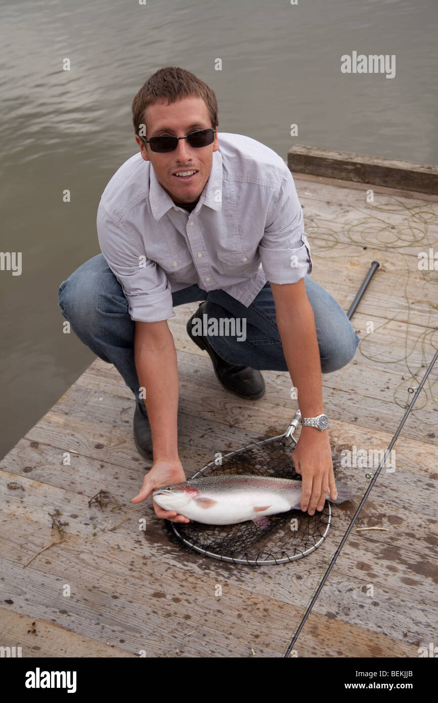 A happy trout fisherman with a 4lb 5oz rainbow trout at Norton Trout ...