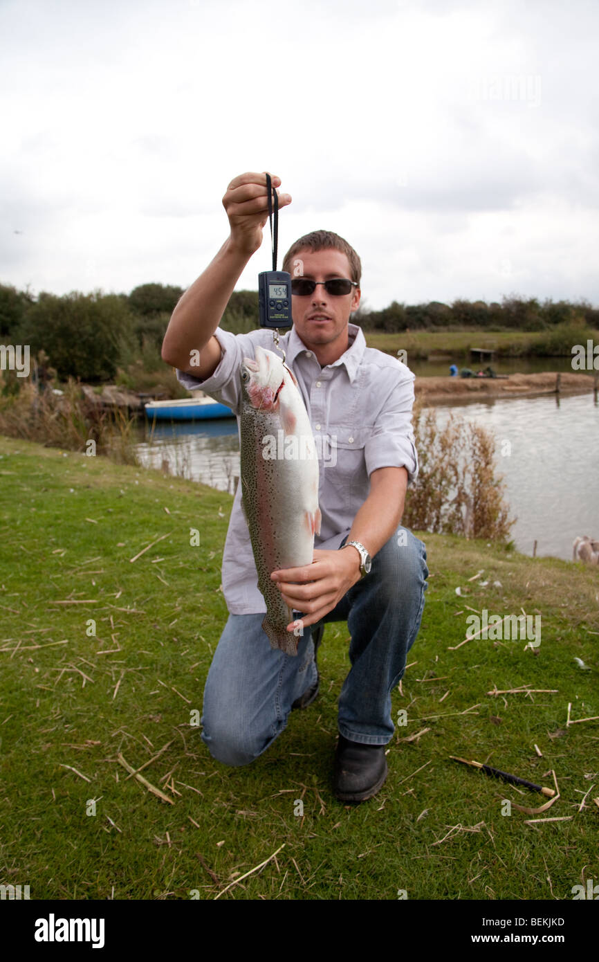 A happy trout fisherman with a 4lb 5oz rainbow trout at Norton Trout ...