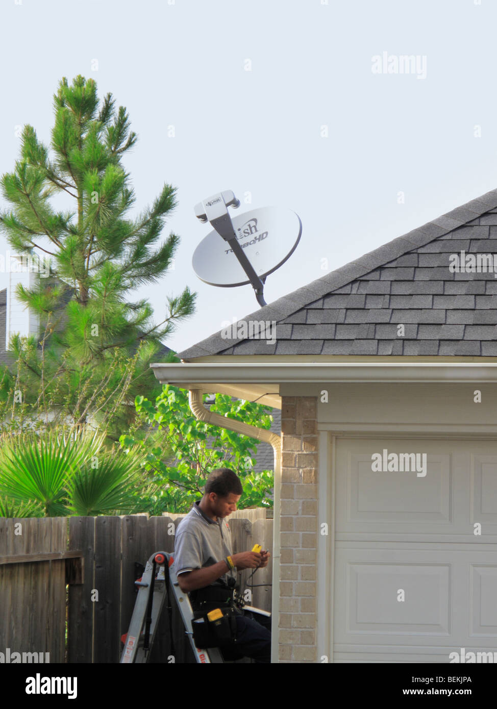 Satellite dish installation Stock Photo - Alamy