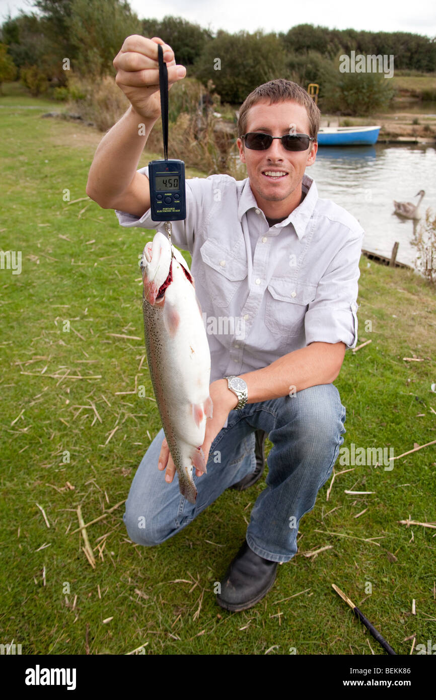 A happy trout fisherman with a 4lb 5oz rainbow trout at Norton Trout ...