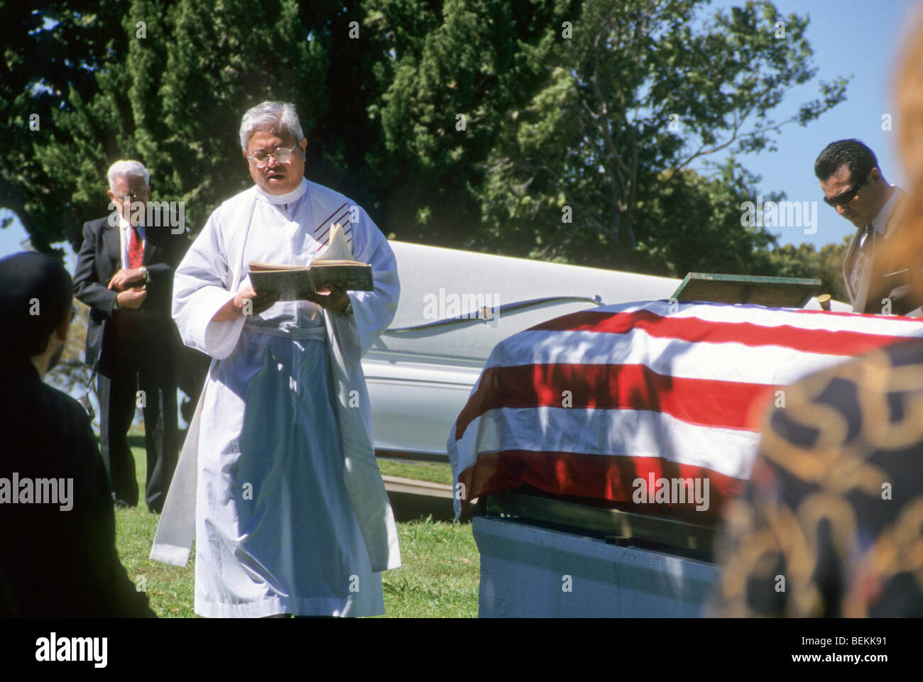 formal ceremony priest Catholic marine burial Stock Photo - Alamy