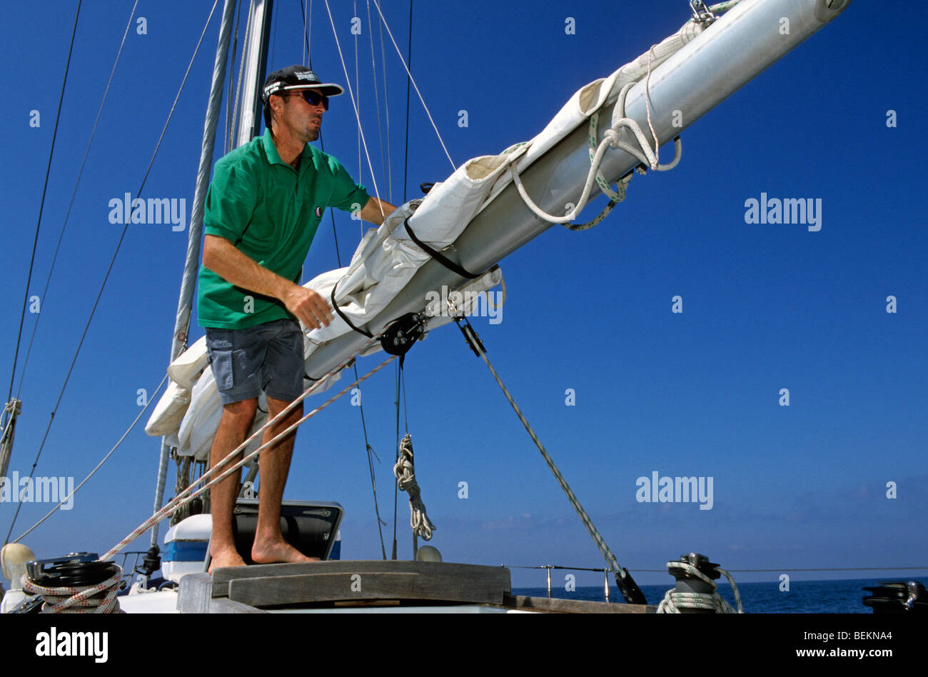 Yachtsman working on sailing boat, Mare, Tuscany, Italy Stock Photo - Alamy